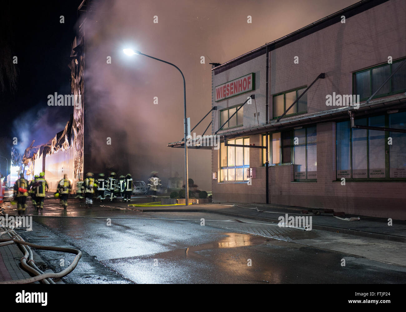 Lohne, Germany. 28th Mar, 2016. Smoke floating above the smoldering ...
