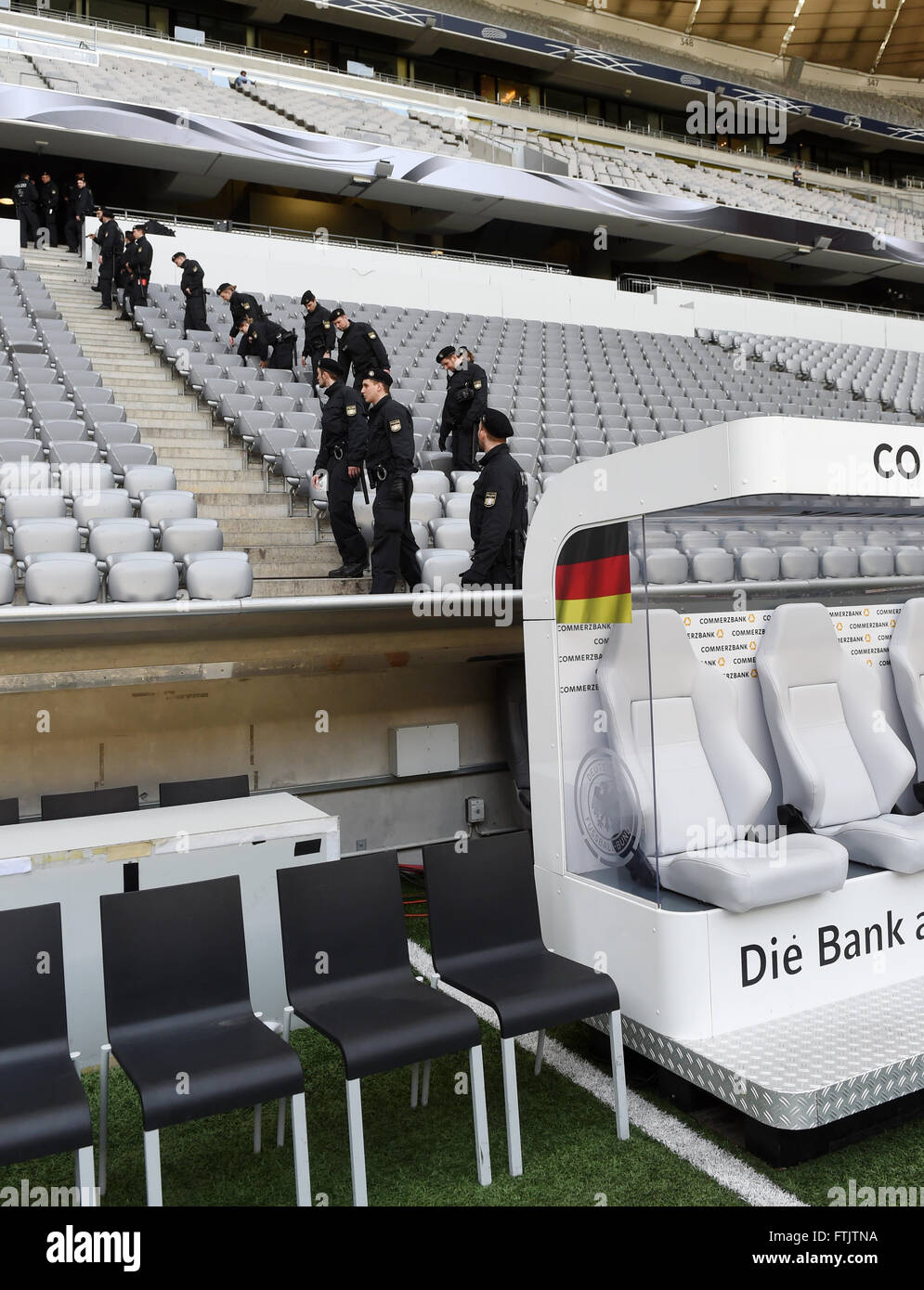 Munich, Germany. 29th Mar, 2016. Police officers check the seating rows ...