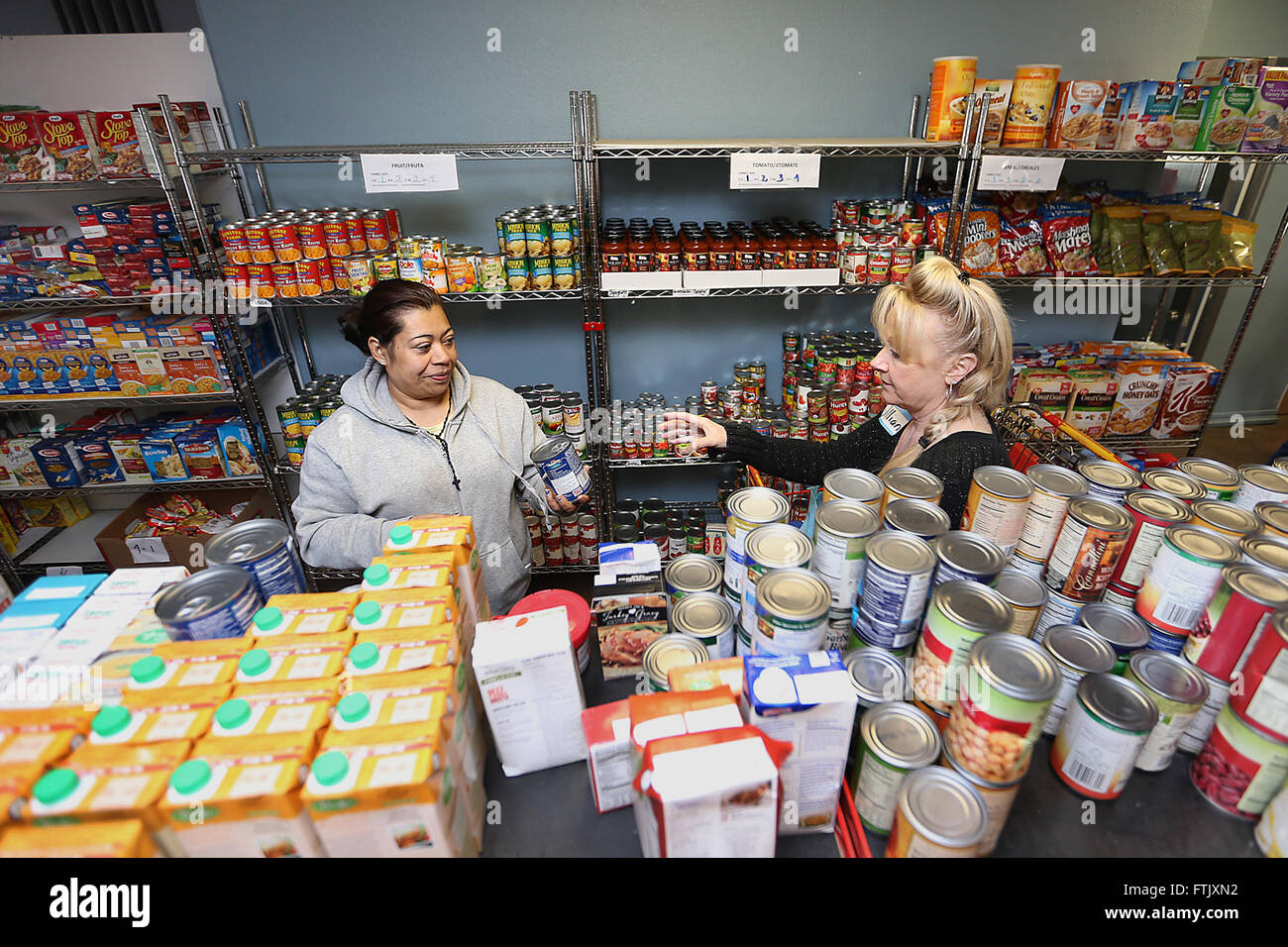Napa, CA, USA. 16th Mar, 2016. Napa Food Bank volunteer Jillian Ryan ...