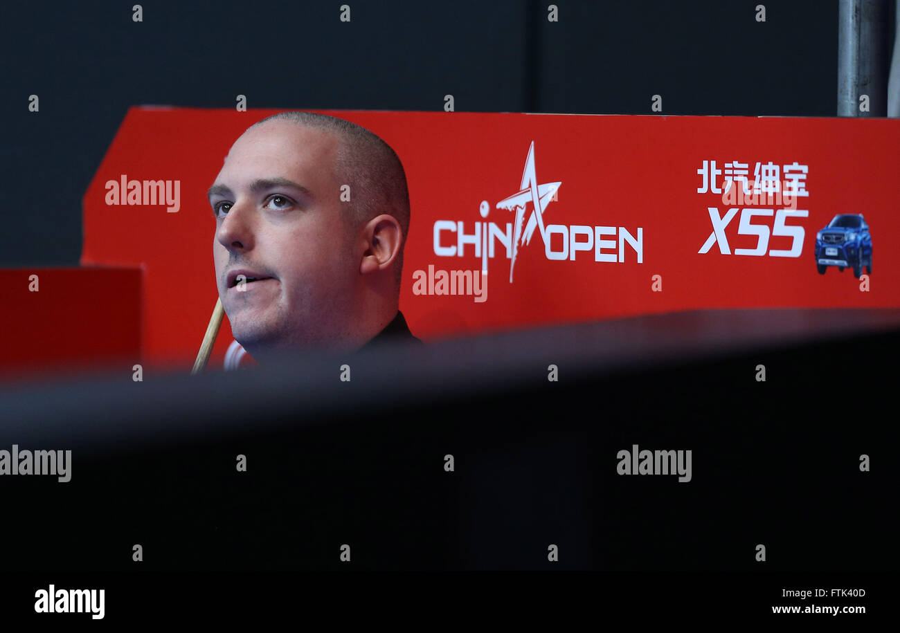 Beijing, China. 30th Mar, 2016. David Grace of England reacts during ...