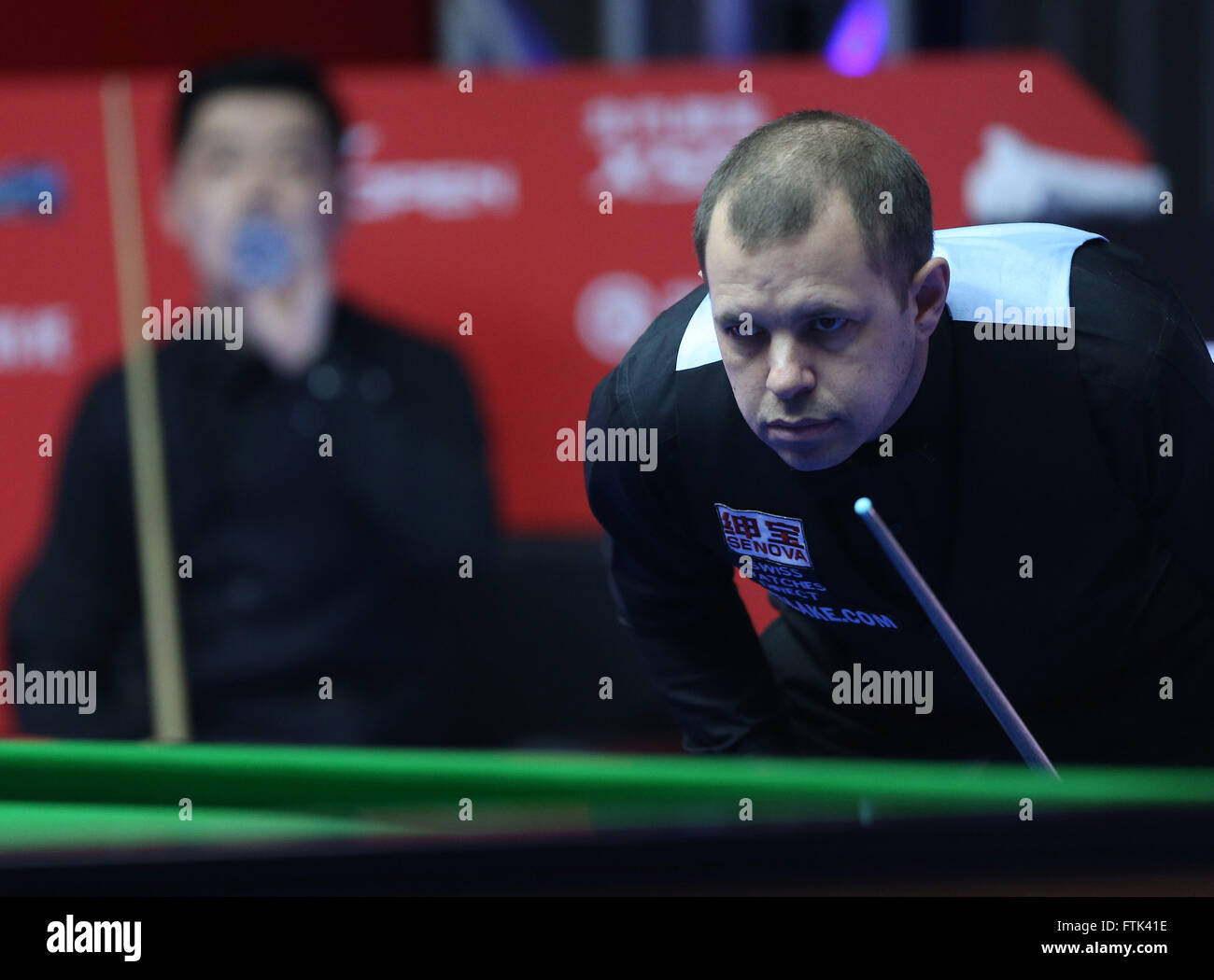 Beijing, China. 30th Mar, 2016. Barry Hawkins of England competes ...
