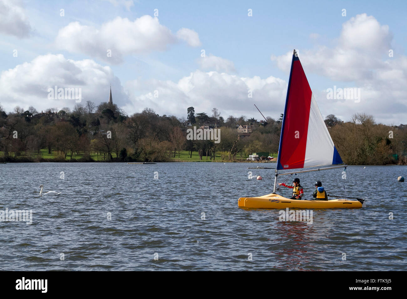 Wimbledon London,UK. 30th March 2016. Sailing dinghies on a sunny ...