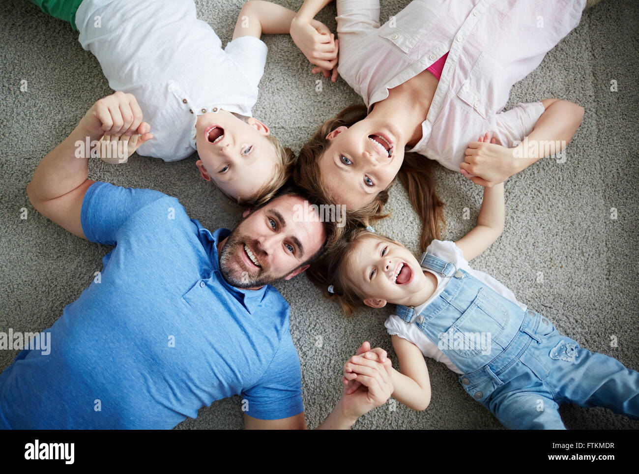 Happy family circle hi-res stock photography and images - Alamy