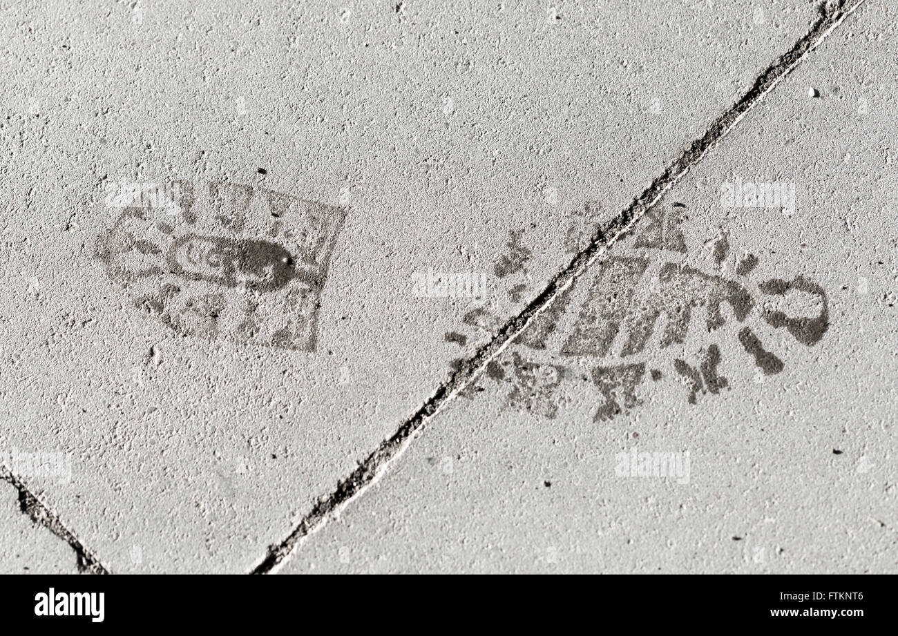 Footstep Imprint on Pavement Stock Photo - Alamy