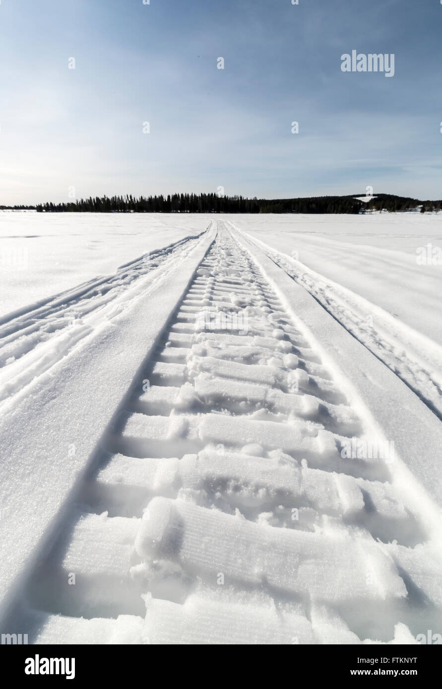 Snow Mobile Tracks on Lake in Sweden Stock Photo - Alamy