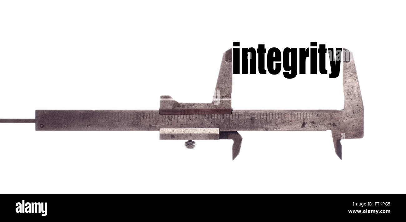 Color horizontal shot of a caliper and measuring the word "integrity ...