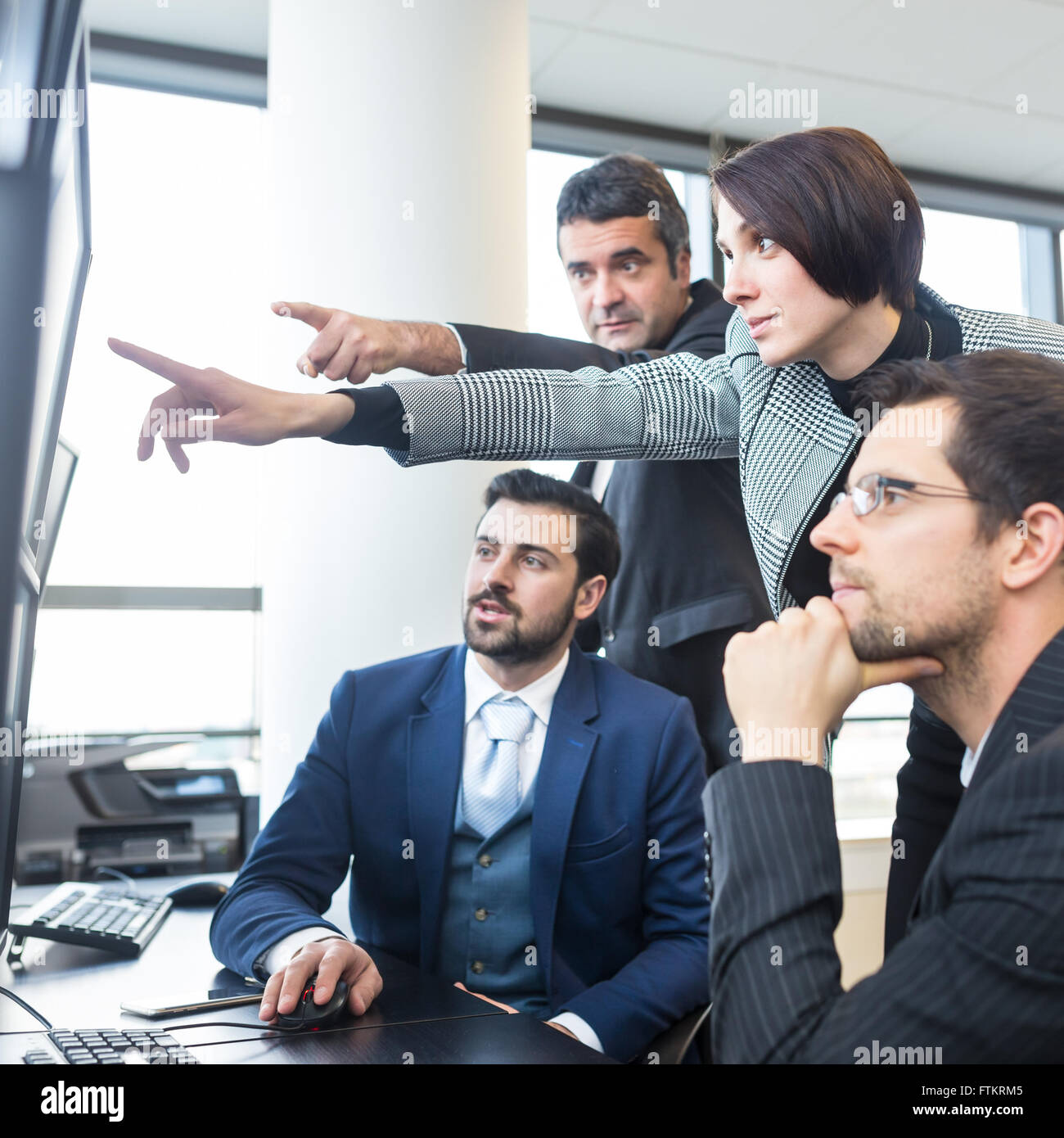 Business team working in corporate office Stock Photo - Alamy