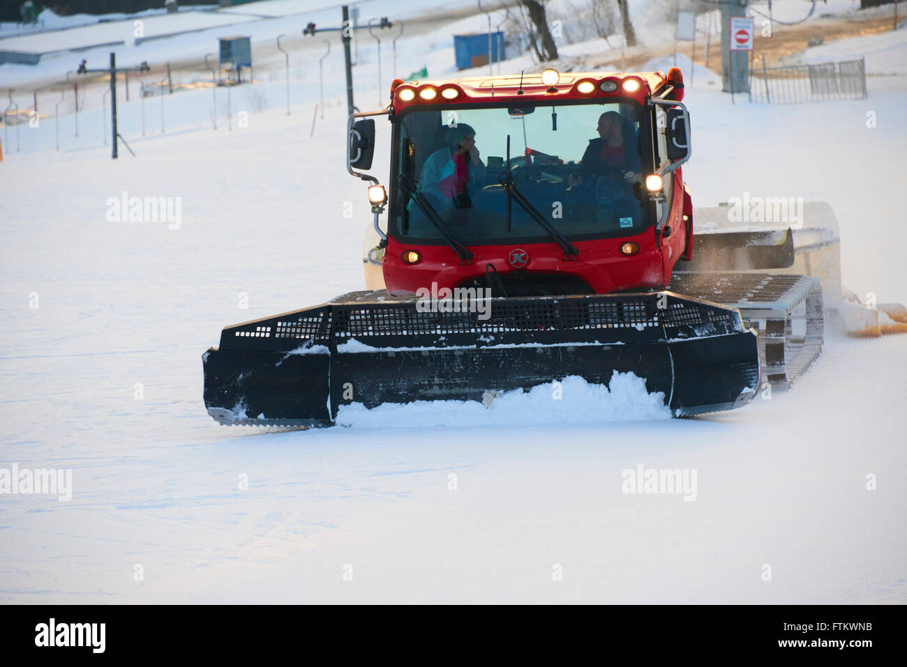 Red snowcat on mountain hi-res stock photography and images - Alamy