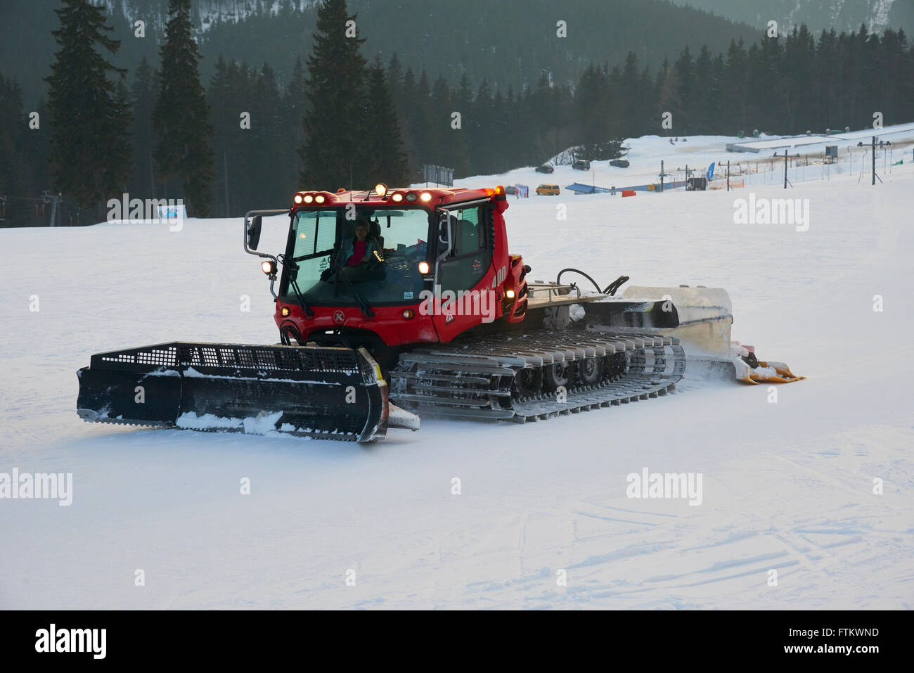 Snowcat on a snowy mountain Stock Photo - Alamy