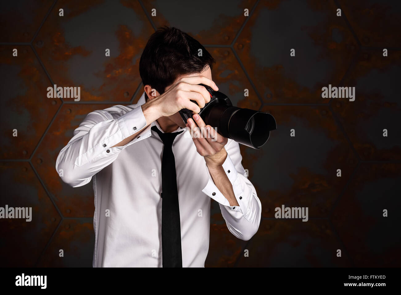 Professional photographer at work Stock Photo - Alamy