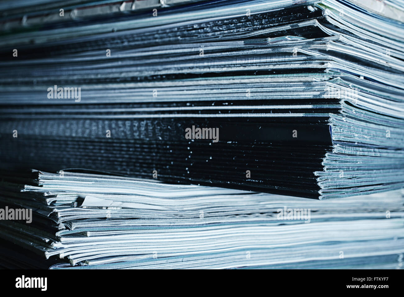 Large stack of magazines on table close-up Stock Photo - Alamy
