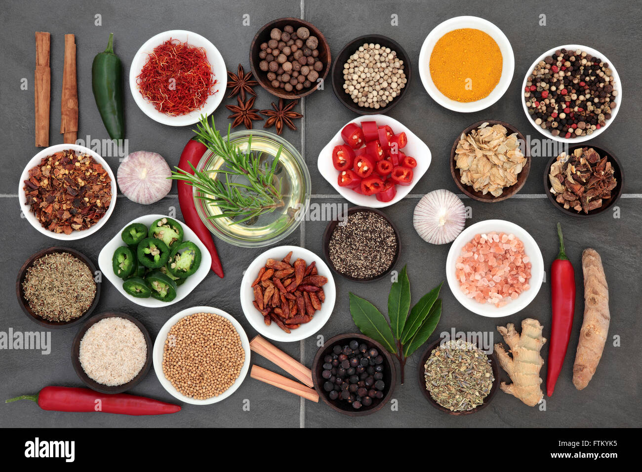 Large herb and spice food seasoning sampler with olive oil over ...