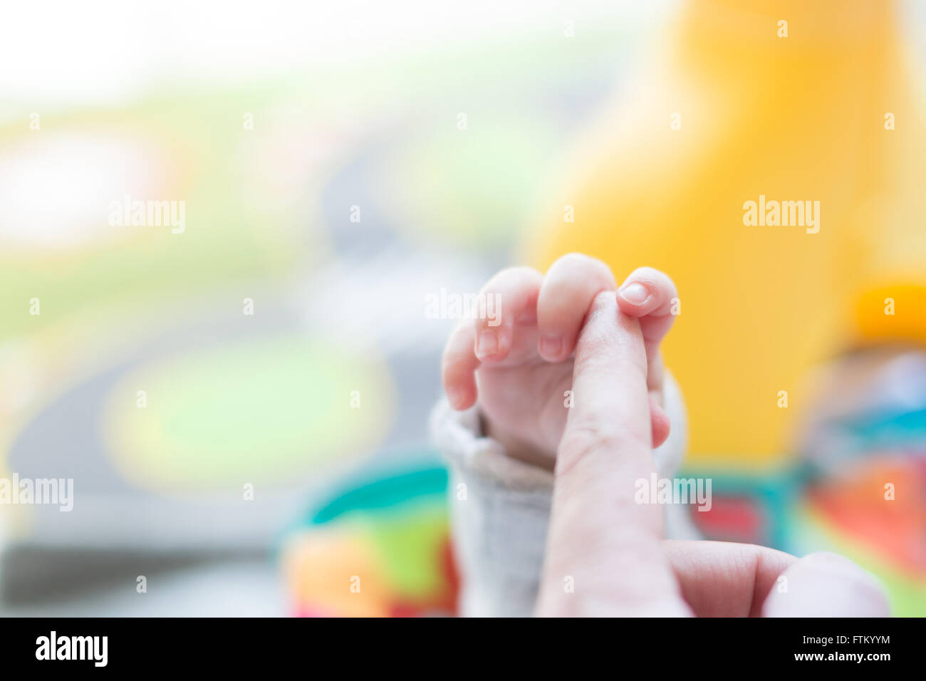 Happy newborn baby playing, family life concepts Stock Photo - Alamy