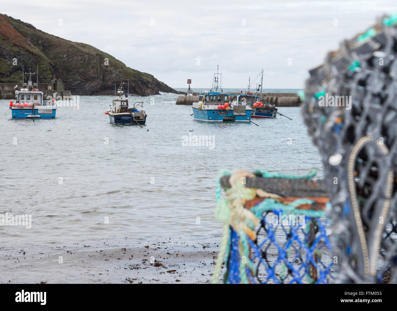 Fishing boats in the harbour in Port Isaac,Cornwall Stock Photo - Alamy