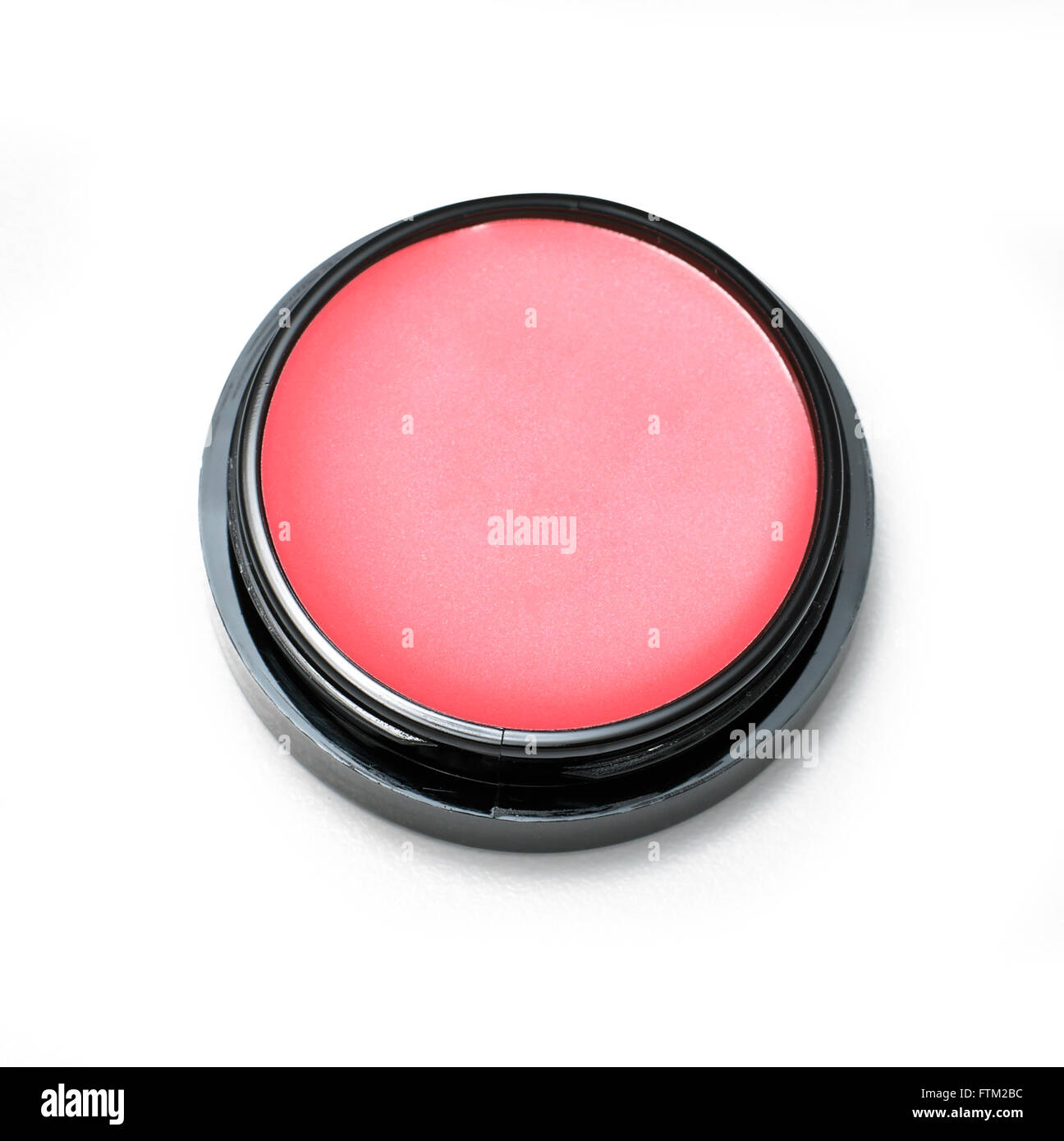 Angled overhead shot of pink lip balm Stock Photo - Alamy