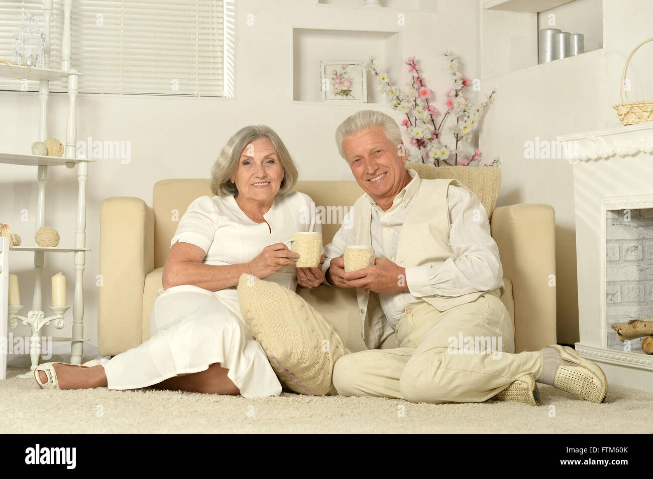 Elderly people with tea Stock Photo - Alamy