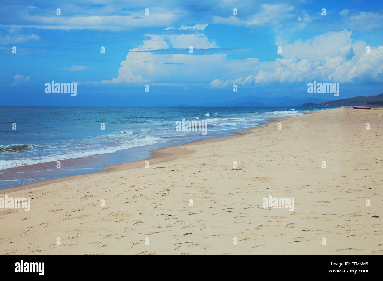 Landscape with sea, mountains and sky with clouds Stock Photo - Alamy