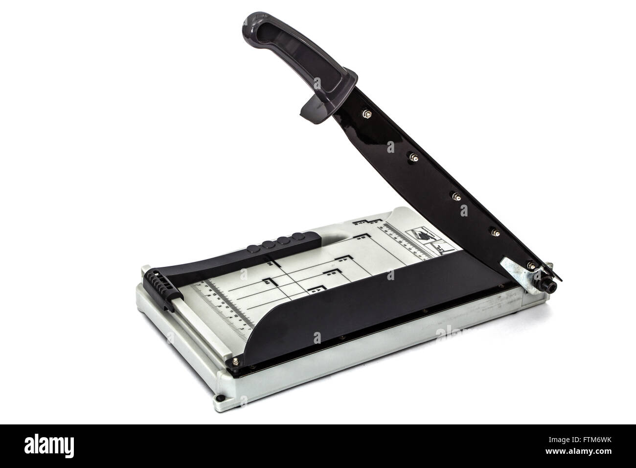 Cutter for a paper, isolated on white background Stock Photo - Alamy