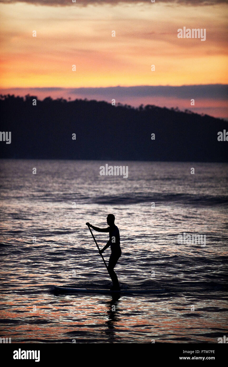 Practitioner stand up paddle beach coast of Campeche Florianopolis ...