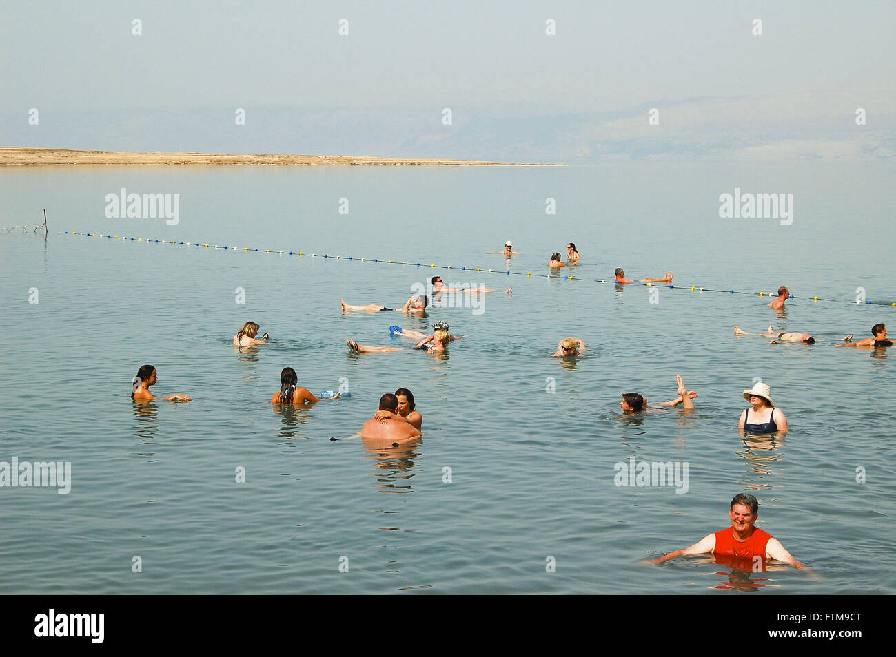 Tourists bathing in the Dead Sea region in the West Bank Stock Photo ...