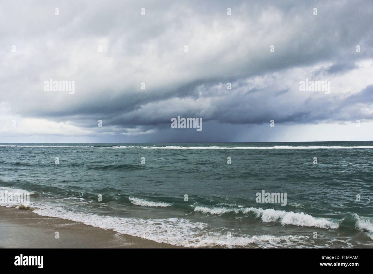 Approaching rain at the beach hi-res stock photography and images - Alamy