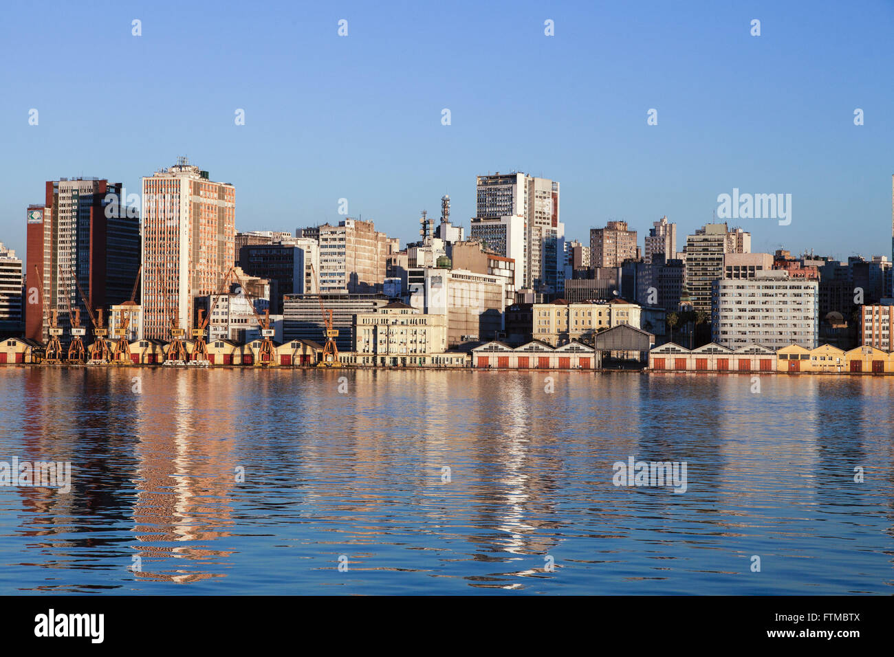 Guaiba River in the late afternoon with port area and downtown in the ...