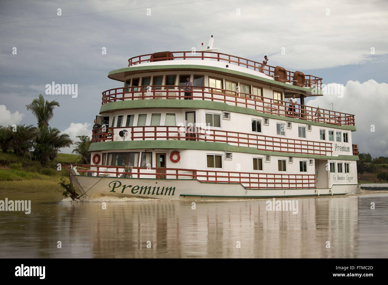 Cage browsing the Rio Solimoes Stock Photo - Alamy