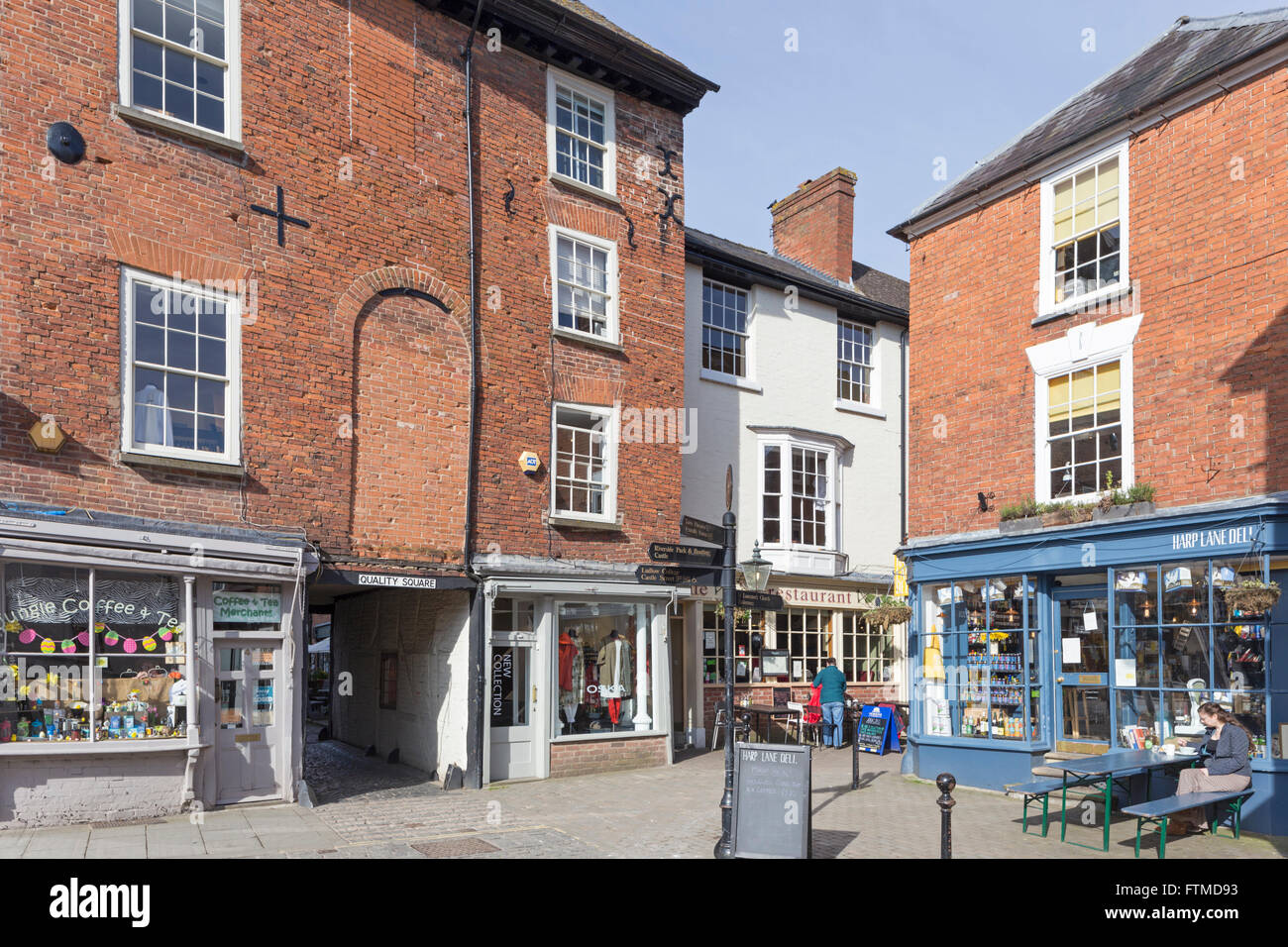 Shopping in Castle square Ludlow, Shropshire, England Stock Photo - Alamy