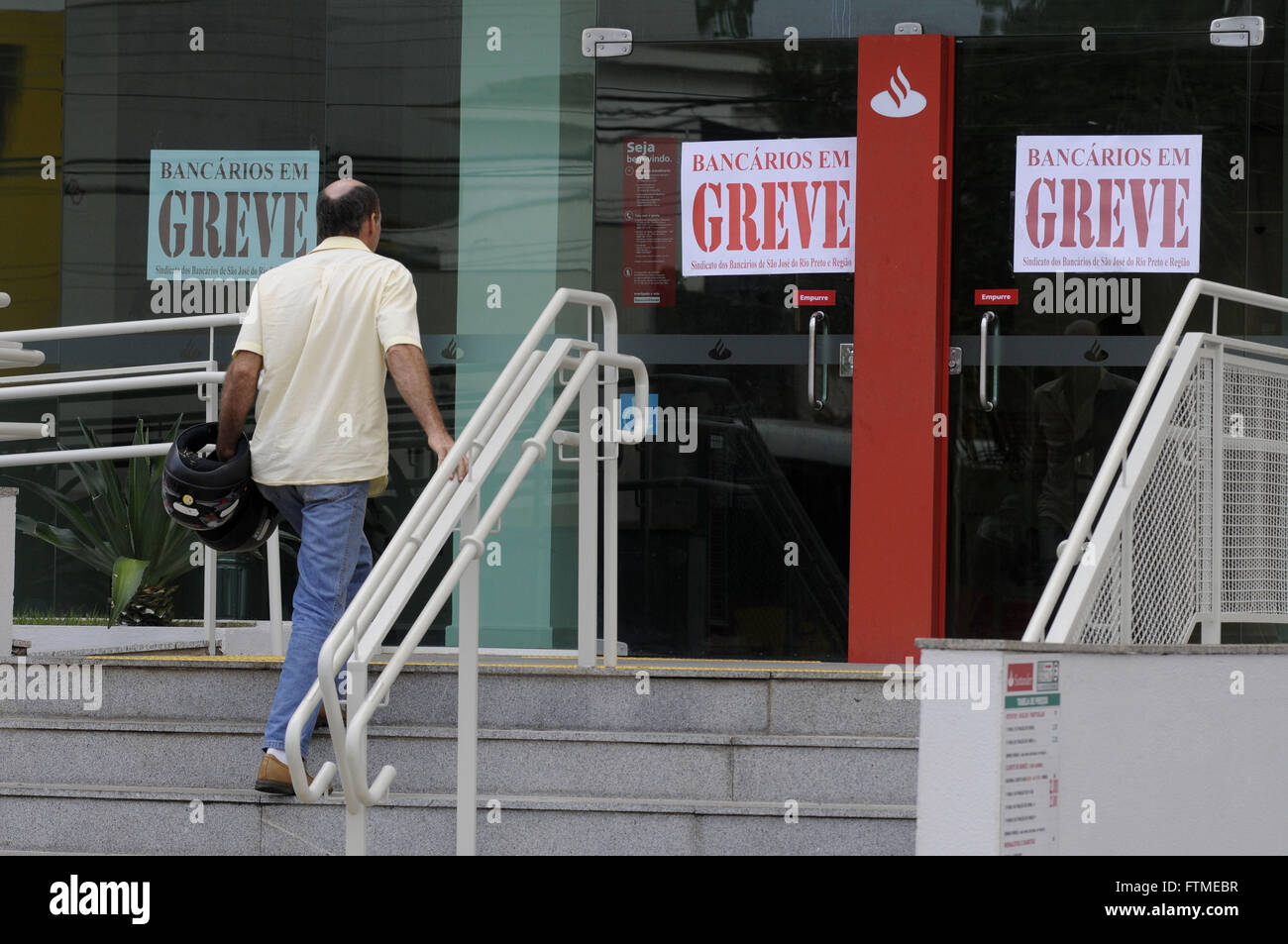 Agency bank with posters announcing the strike Stock Photo - Alamy