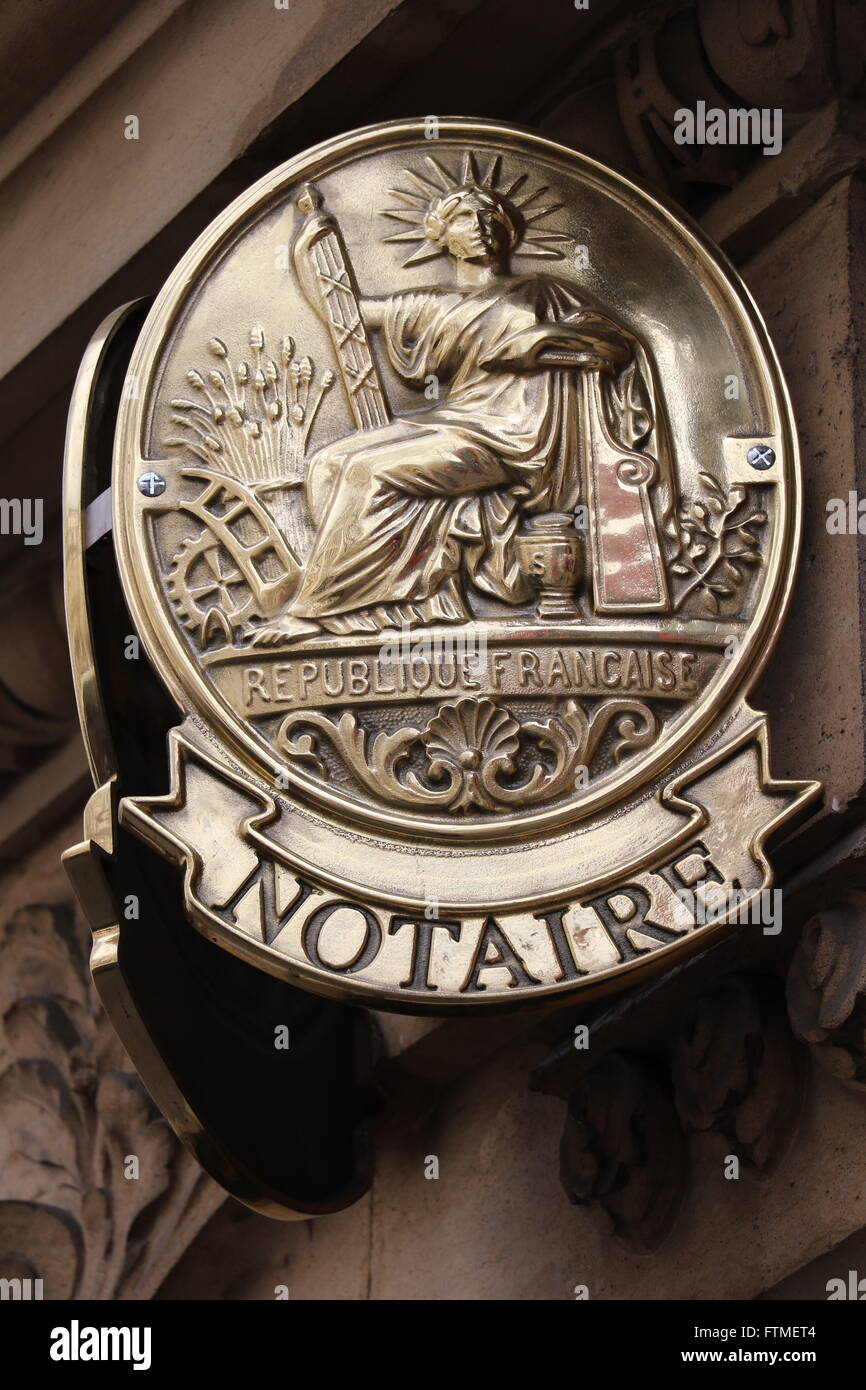 Official french notary's office symbol in Paris Stock Photo - Alamy