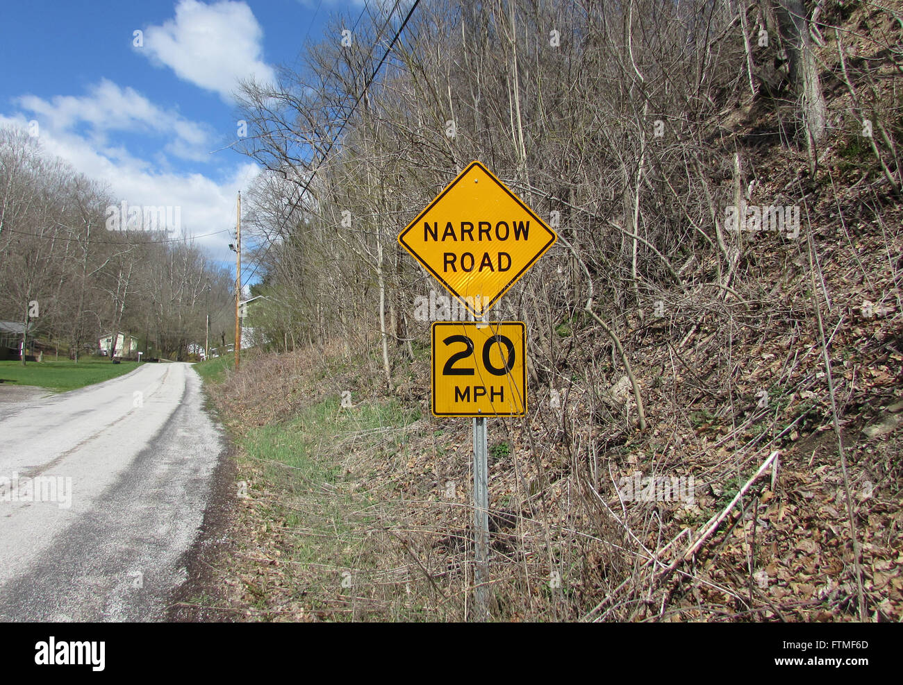 Narrow road sign on rural road in West Virginia Stock Photo - Alamy