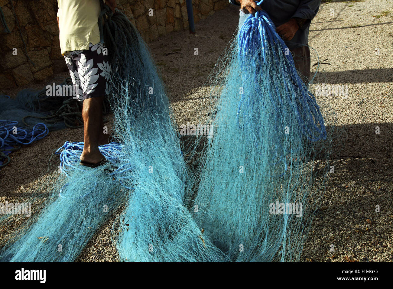 Handling fishing net hi-res stock photography and images - Alamy