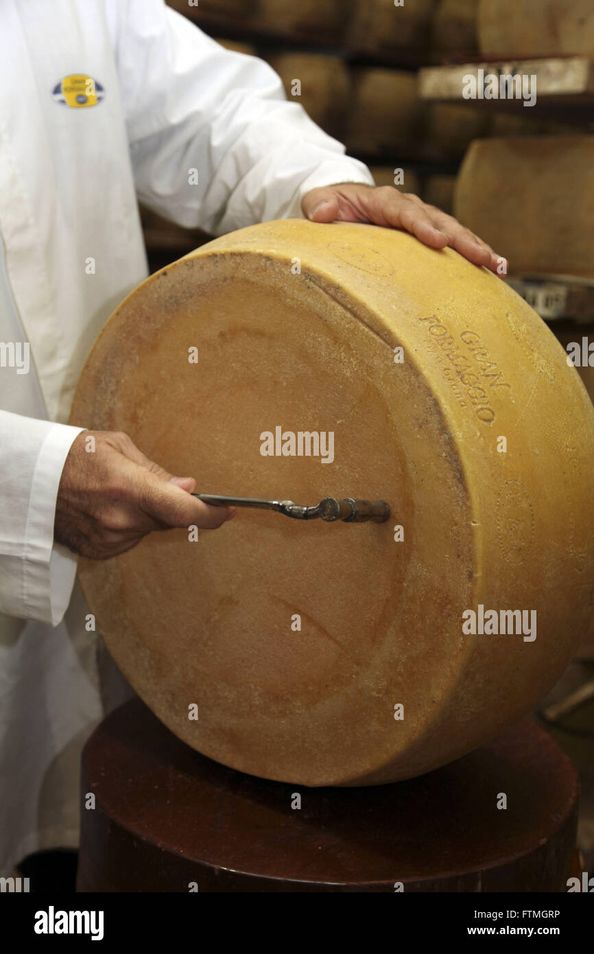 Cheese wheel and hammer hi-res stock photography and images - Alamy