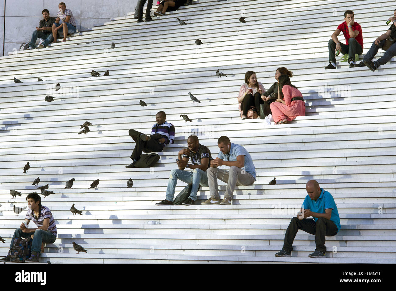 Group Of People Sitting On Steps High Resolution Stock Photography and ...