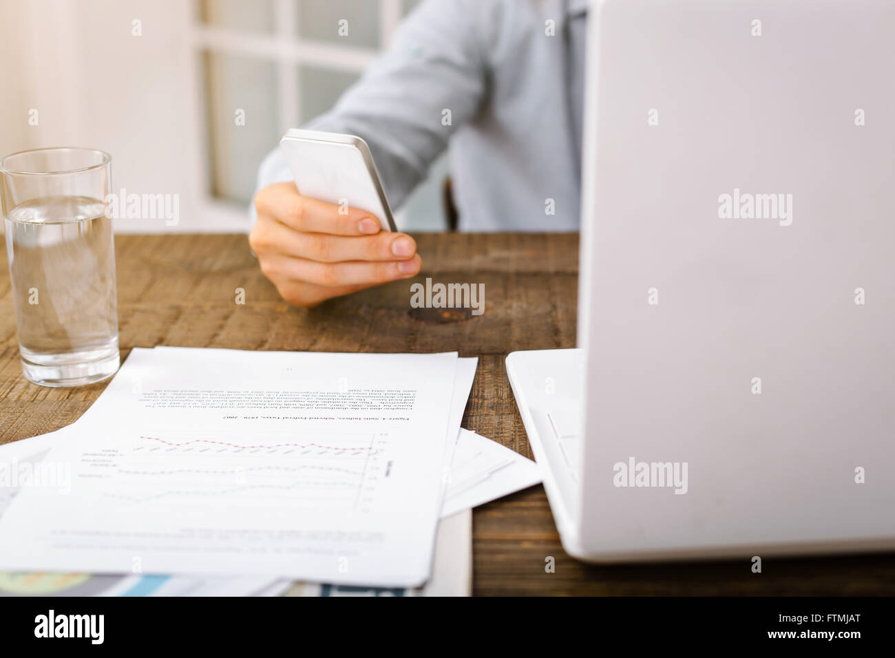 Photo of objects and hands on table Stock Photo - Alamy
