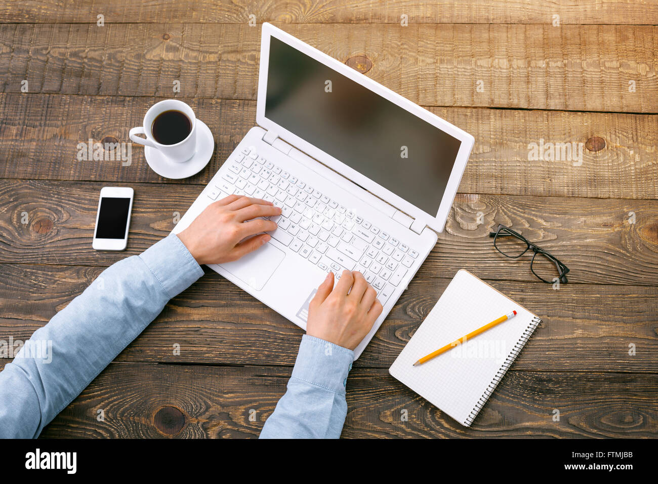 Top view of objects and hands on table Stock Photo - Alamy