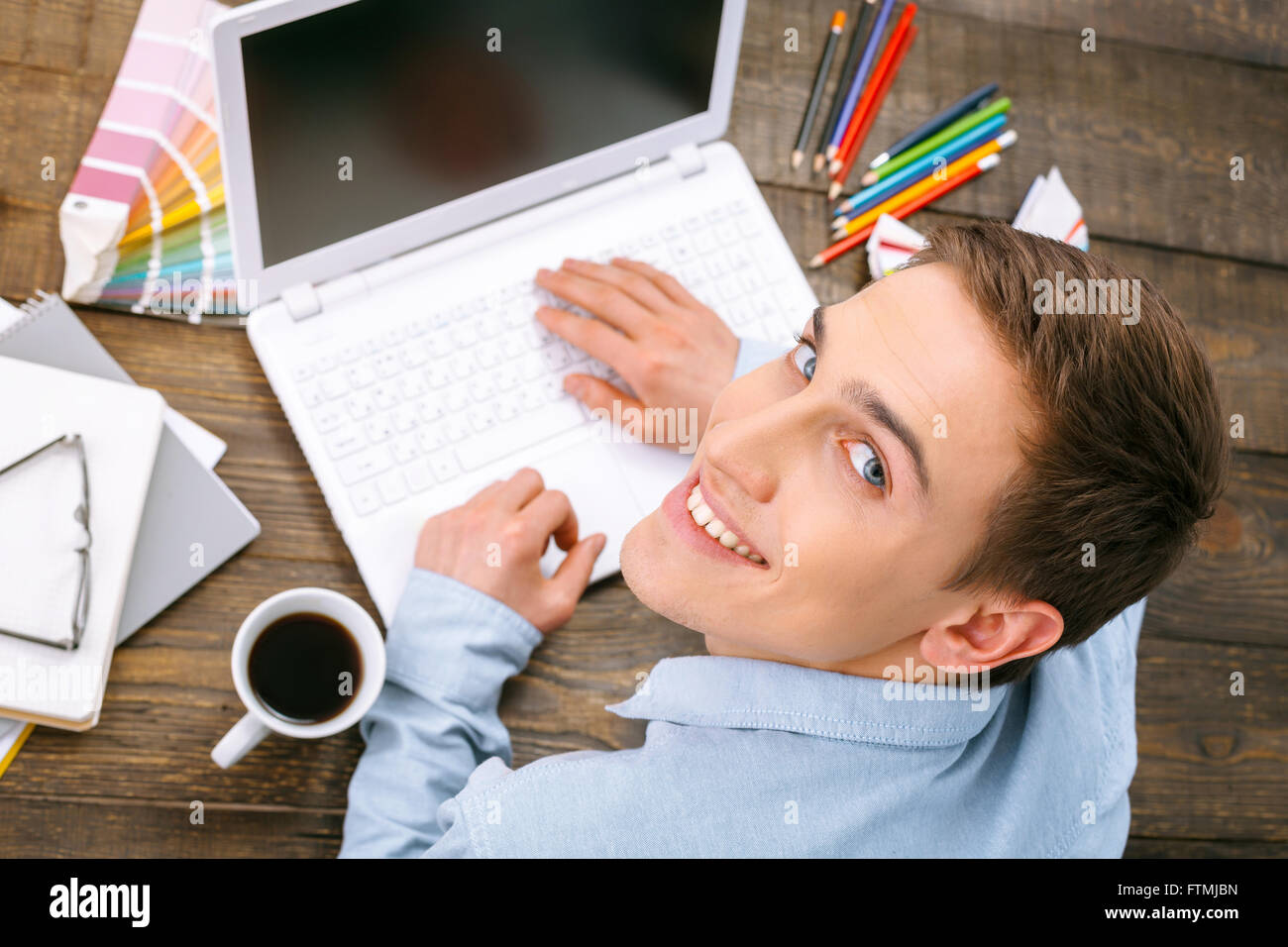 Man on table hi-res stock photography and images - Alamy