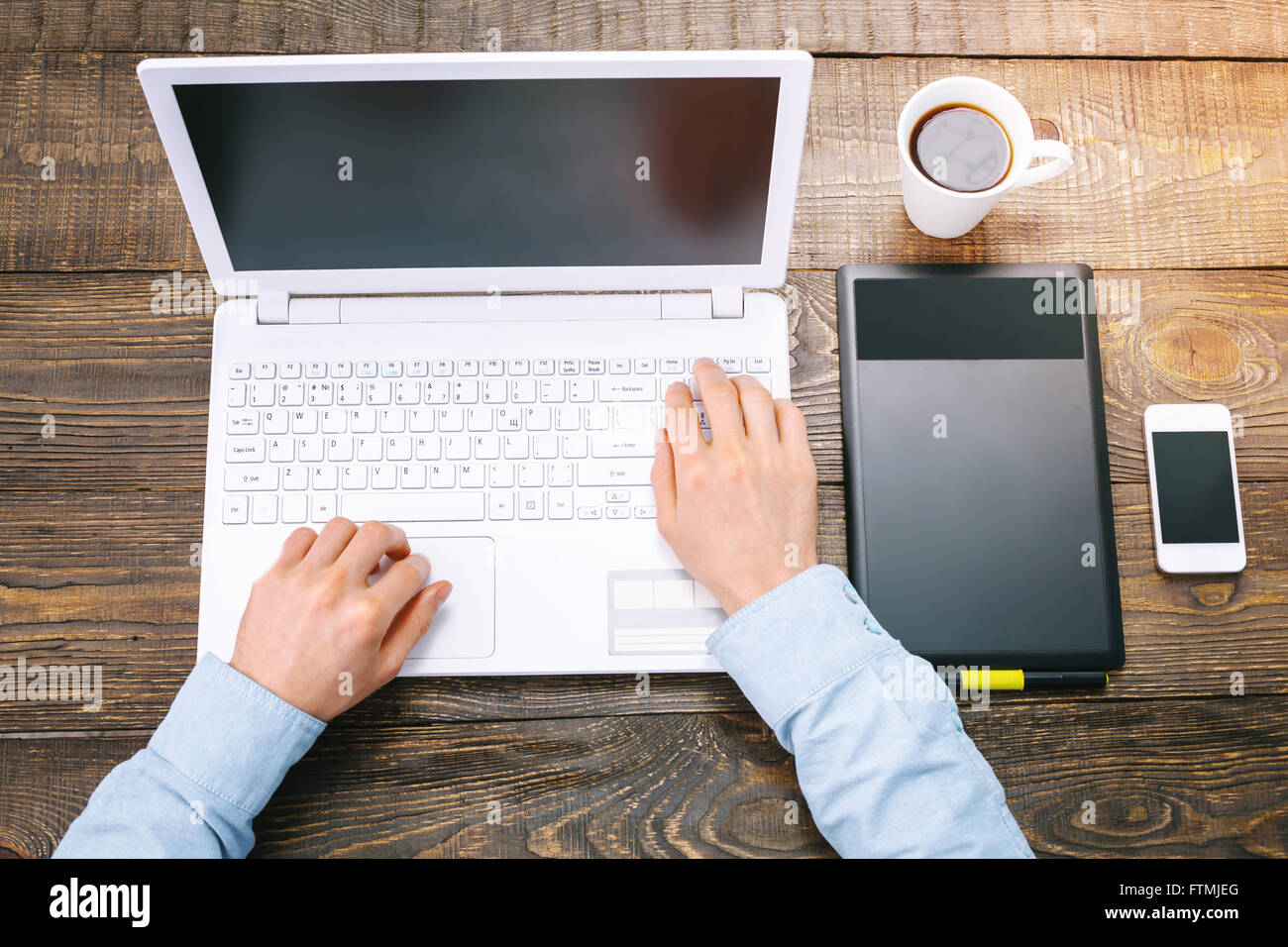 Top view of objects and hands on table Stock Photo - Alamy