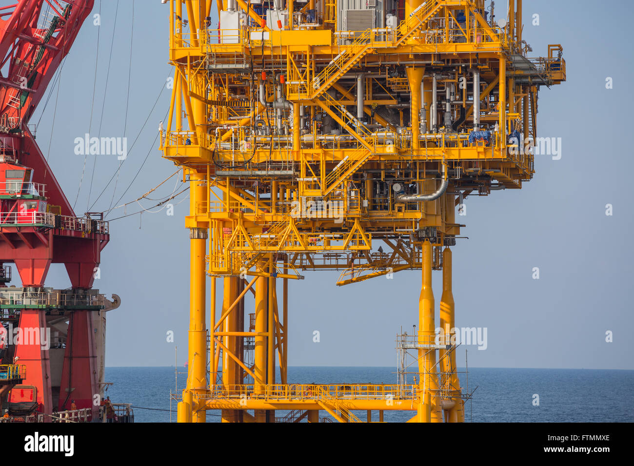 Oil rig lifting for installation on its jacket Stock Photo - Alamy