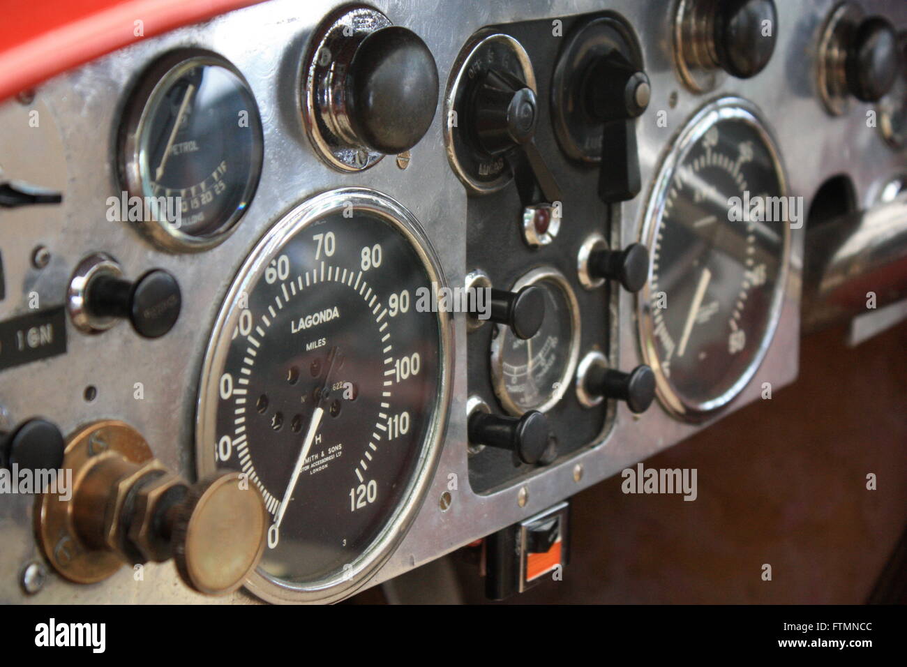 Race car gauges, dials and knobs Stock Photo - Alamy