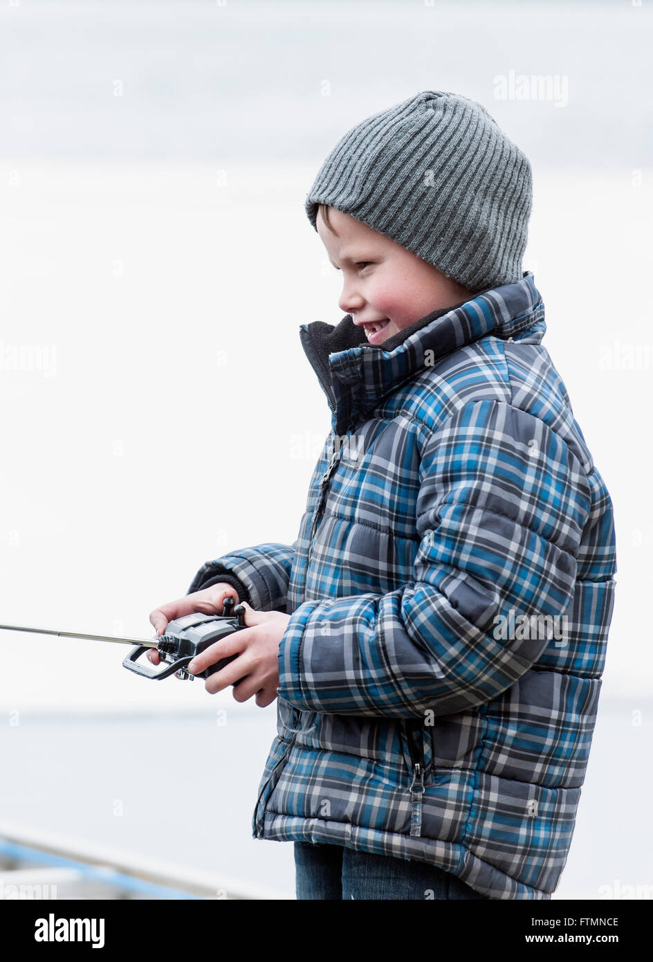 Young boy with radio control Stock Photo - Alamy