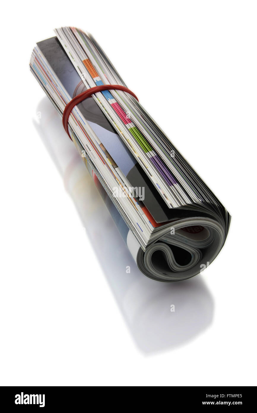 Rolled up magazine hi-res stock photography and images - Alamy