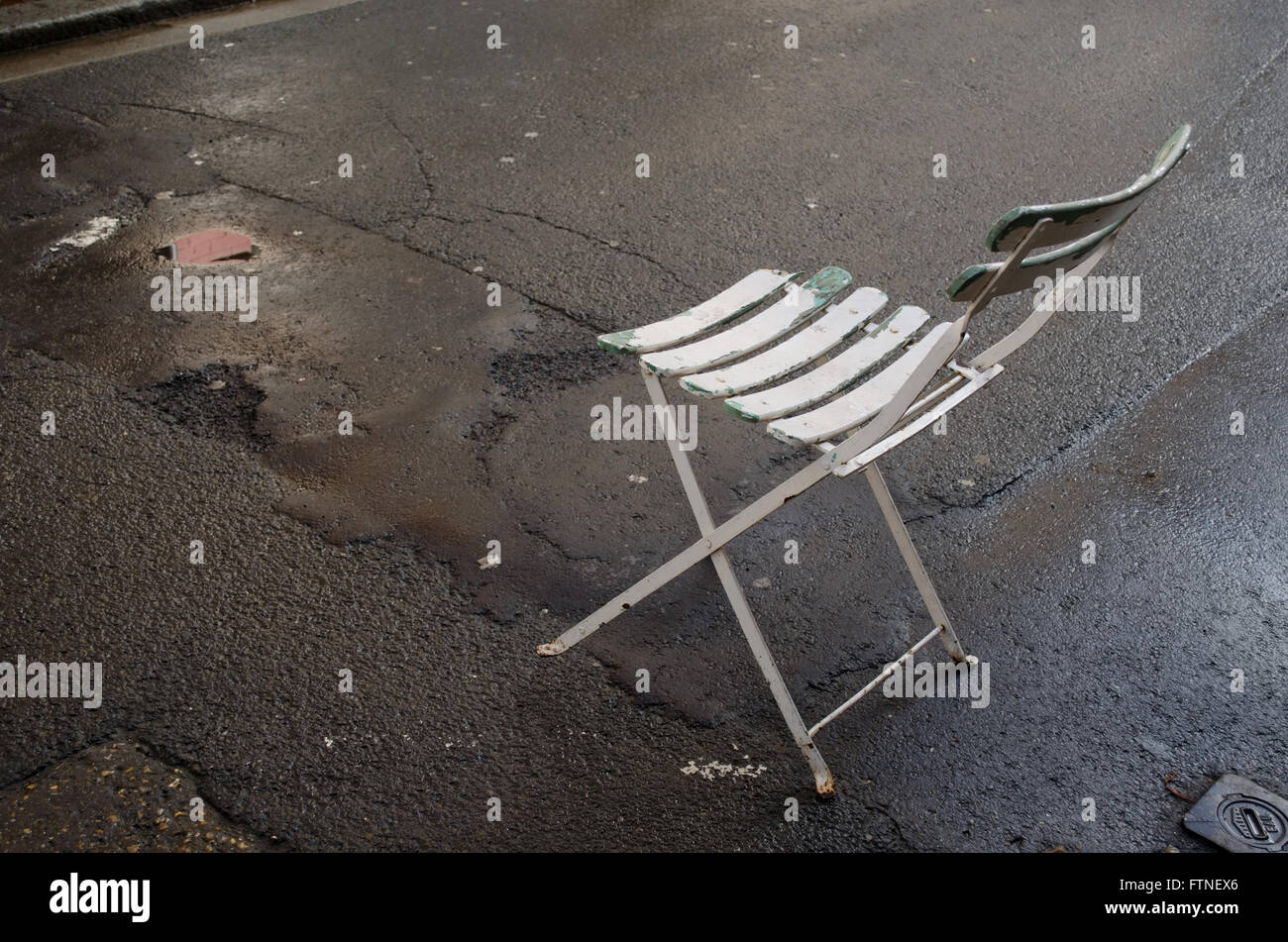 A chair in the street Stock Photo - Alamy