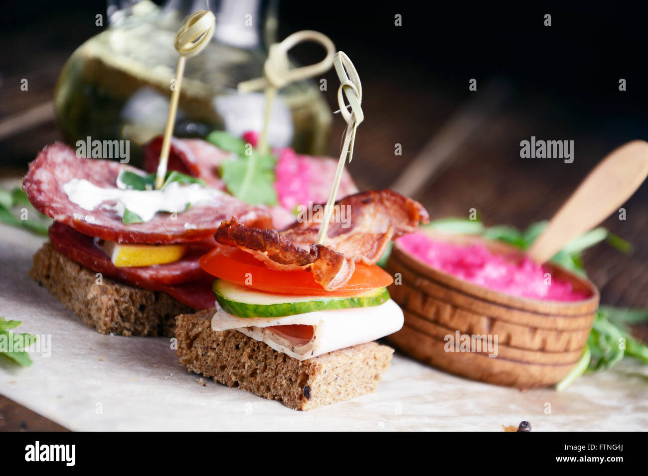 Tasty homemade tapas with different fillings on the table Stock Photo ...