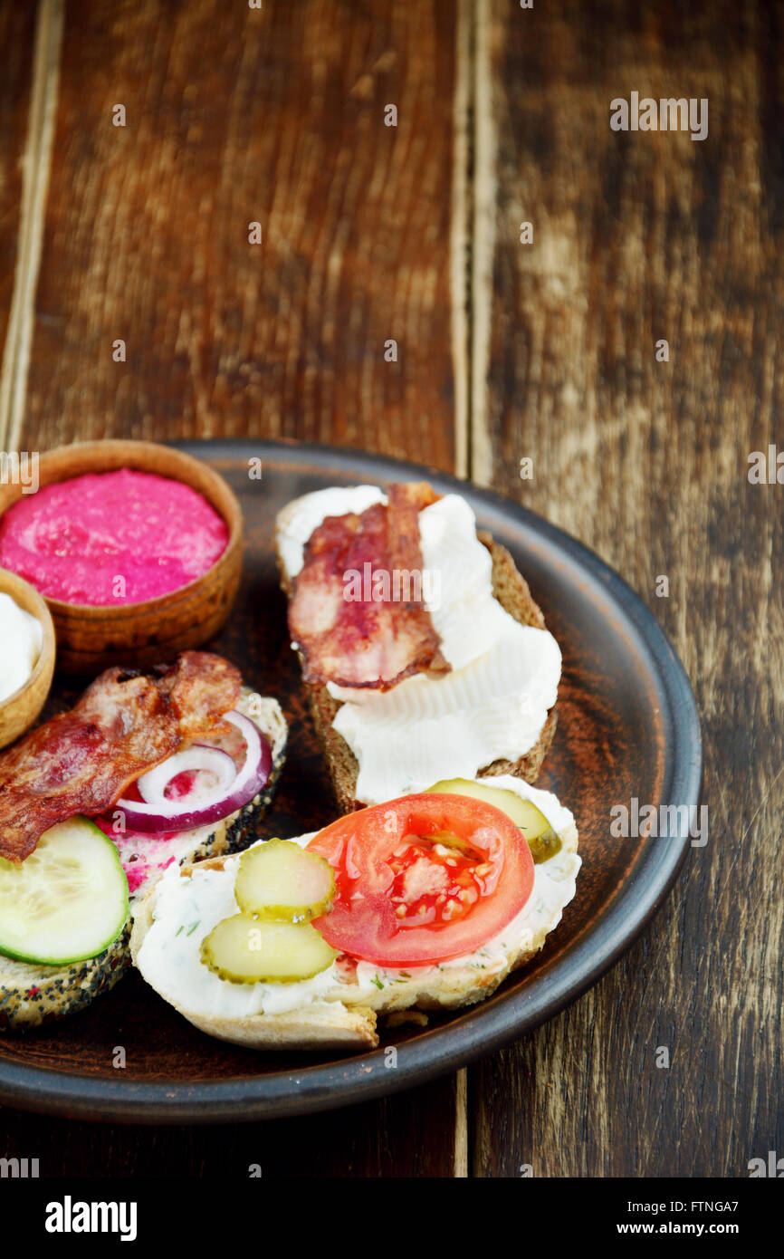 Tasty homemade tapas with different fillings on the table Stock Photo ...