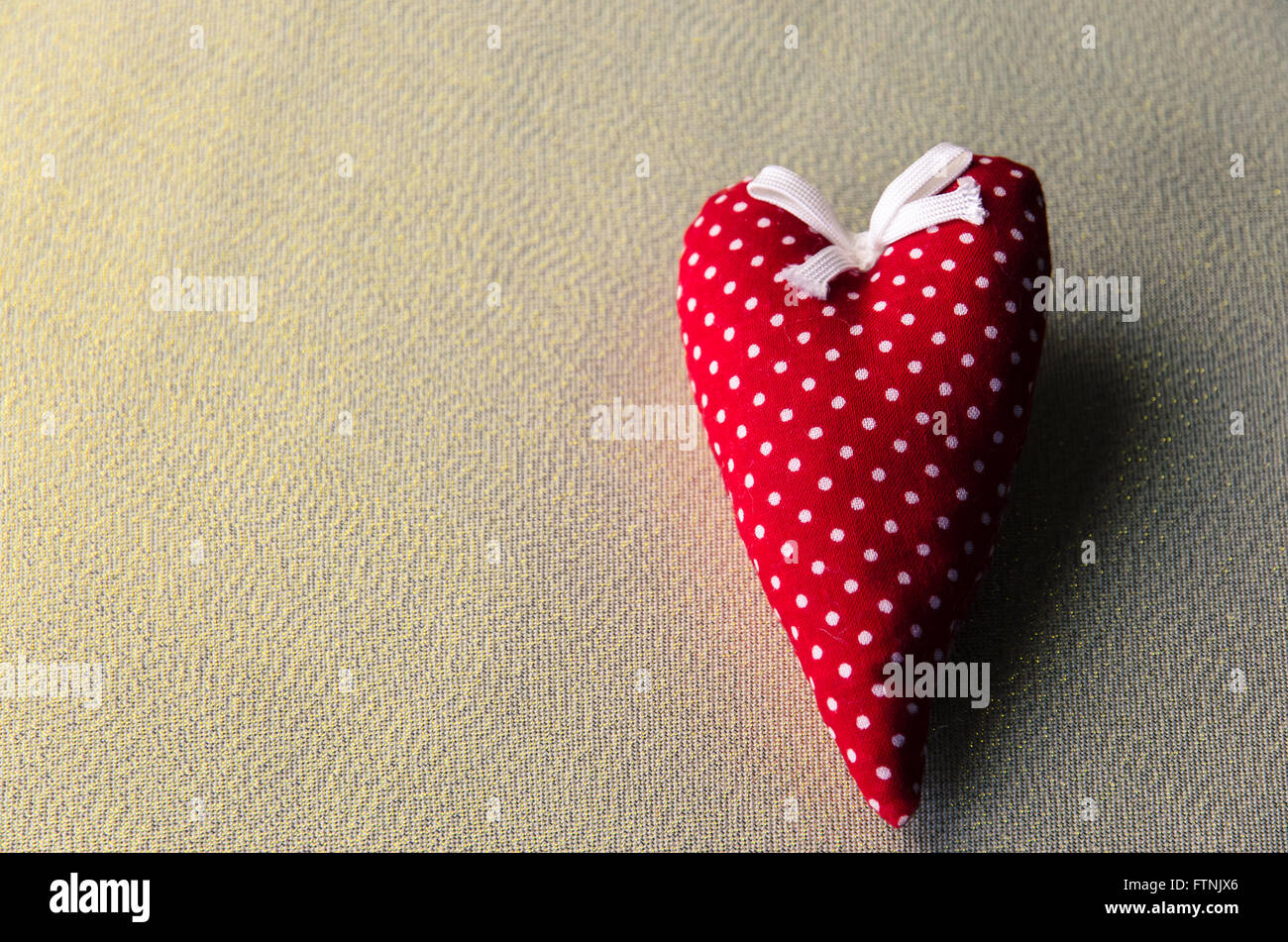 stuff red heart with white dots Stock Photo - Alamy