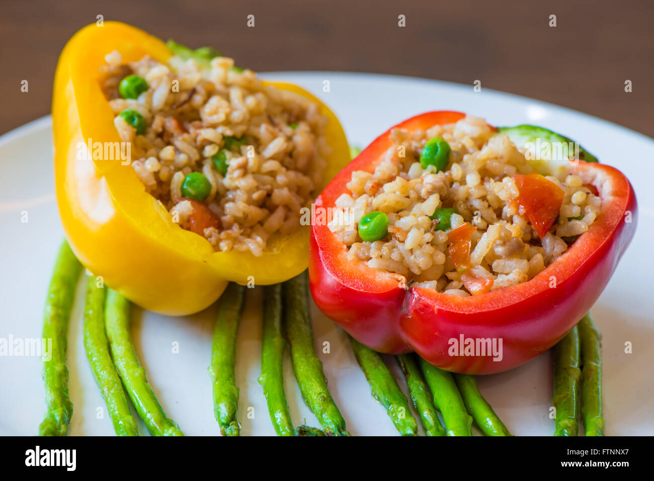 rice pilaf with colorful vegetable in red bell pepper Stock Photo - Alamy