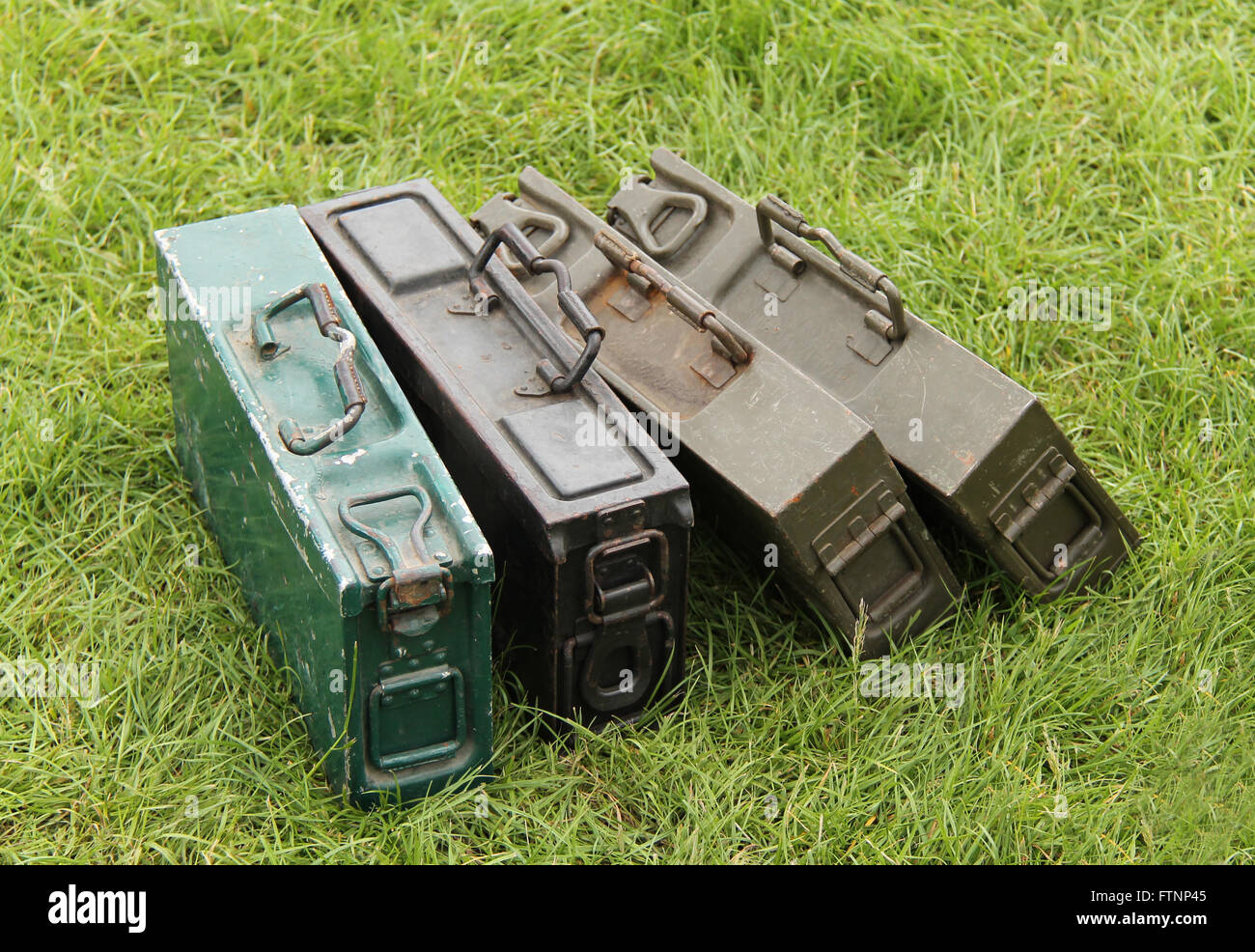 Four Vintage Metal Military Ammunition Bullet Cases Stock Photo - Alamy