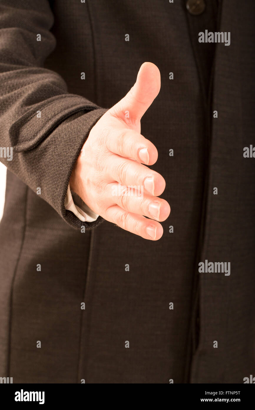 Business man extending hand shake hi-res stock photography and images - Alamy