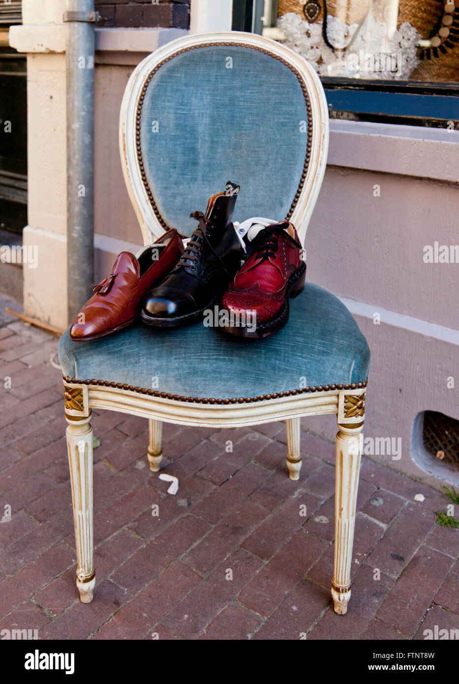 Shoes on chair hi-res stock photography and images - Alamy